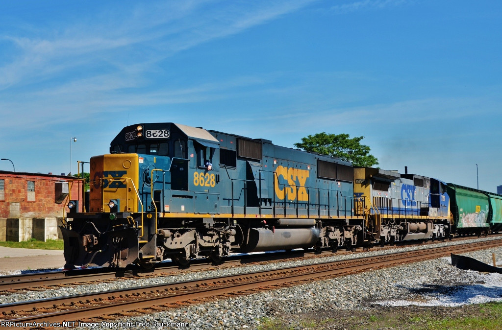 CSX 8628 leads a mixer west.
